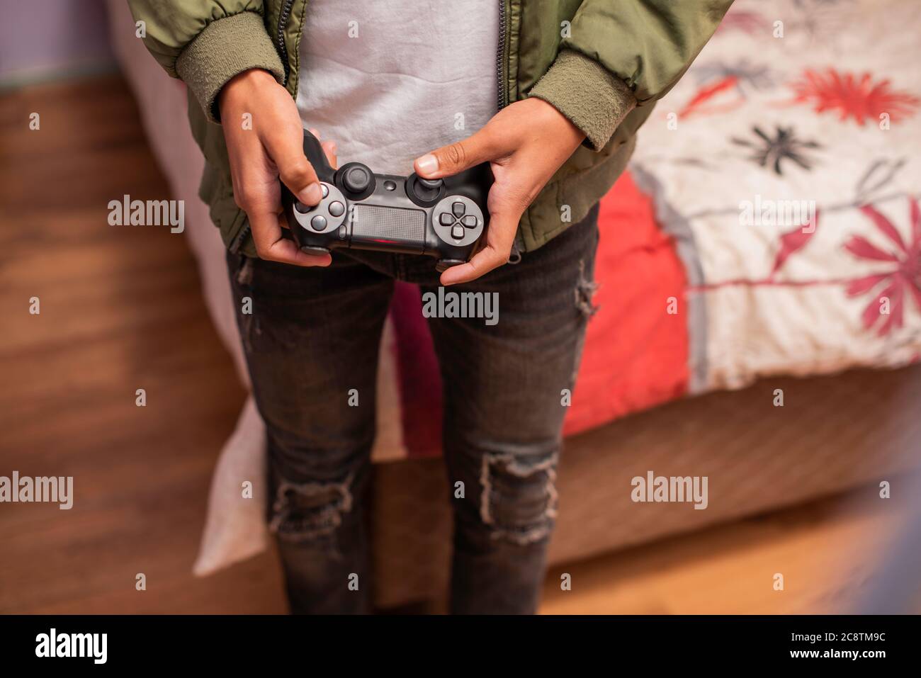 Person using remote control hi-res stock photography and images - Alamy