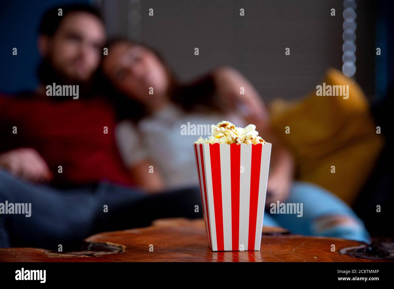 Couple sofa night in tv hi-res stock photography and images - Alamy