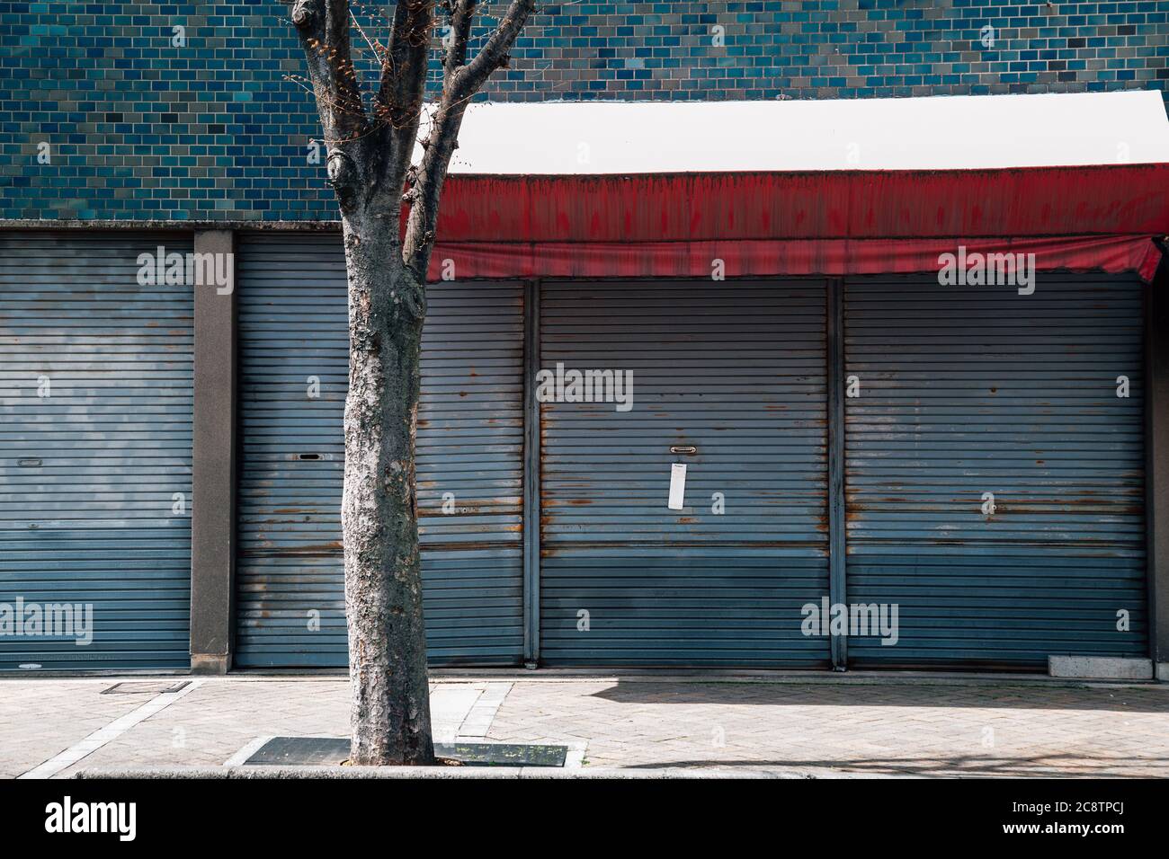 Closed metal shutter door of building. Japanese street view Stock Photo ...