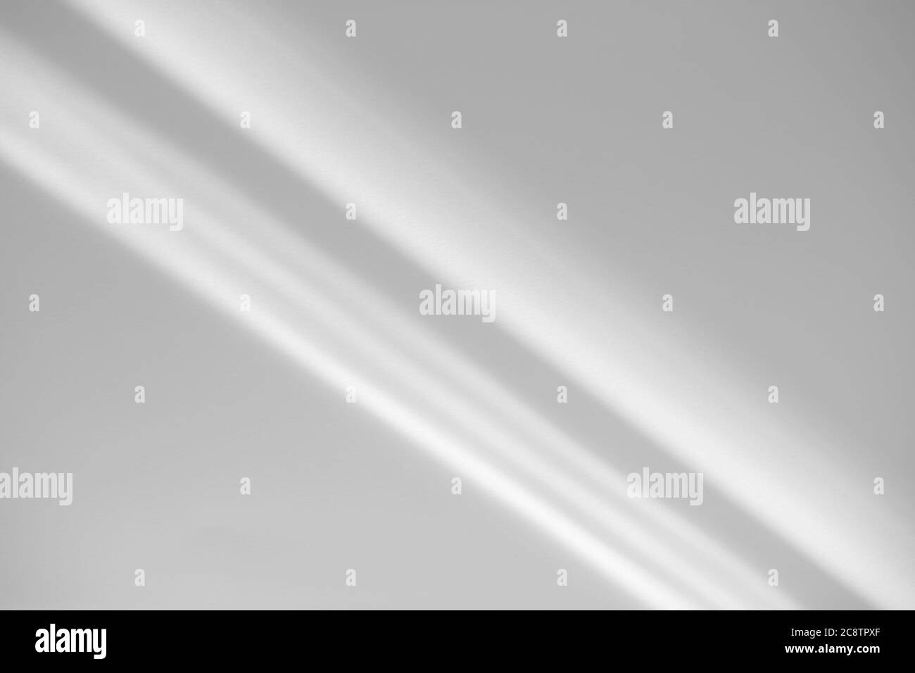 Organic drop shadow on a white wall Stock Photo - Alamy