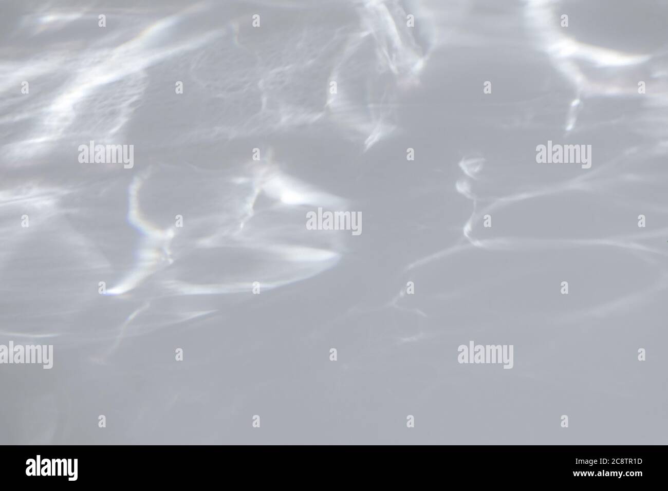 shadow and light caustic effect on a white wall Stock Photo - Alamy