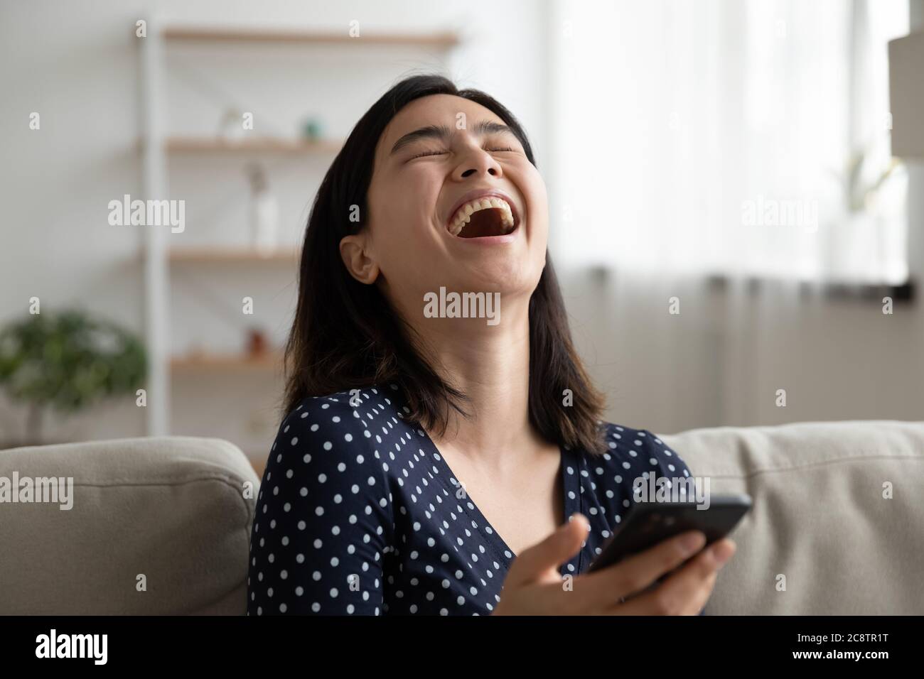 Overjoyed asian woman reading hi-res stock photography and images - Alamy