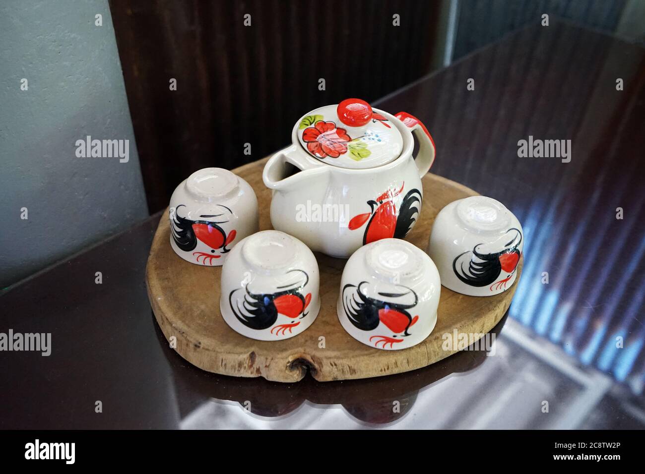 Vintage Chinese porcelain chicken teapot set on wooden tray Stock Photo ...