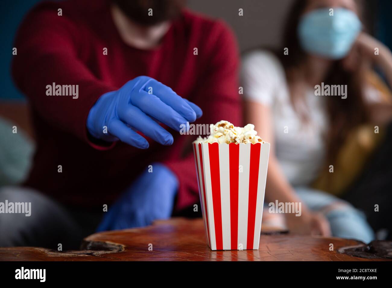Couple wearing protection gloves and mask for Covid-19, coronavirus ...