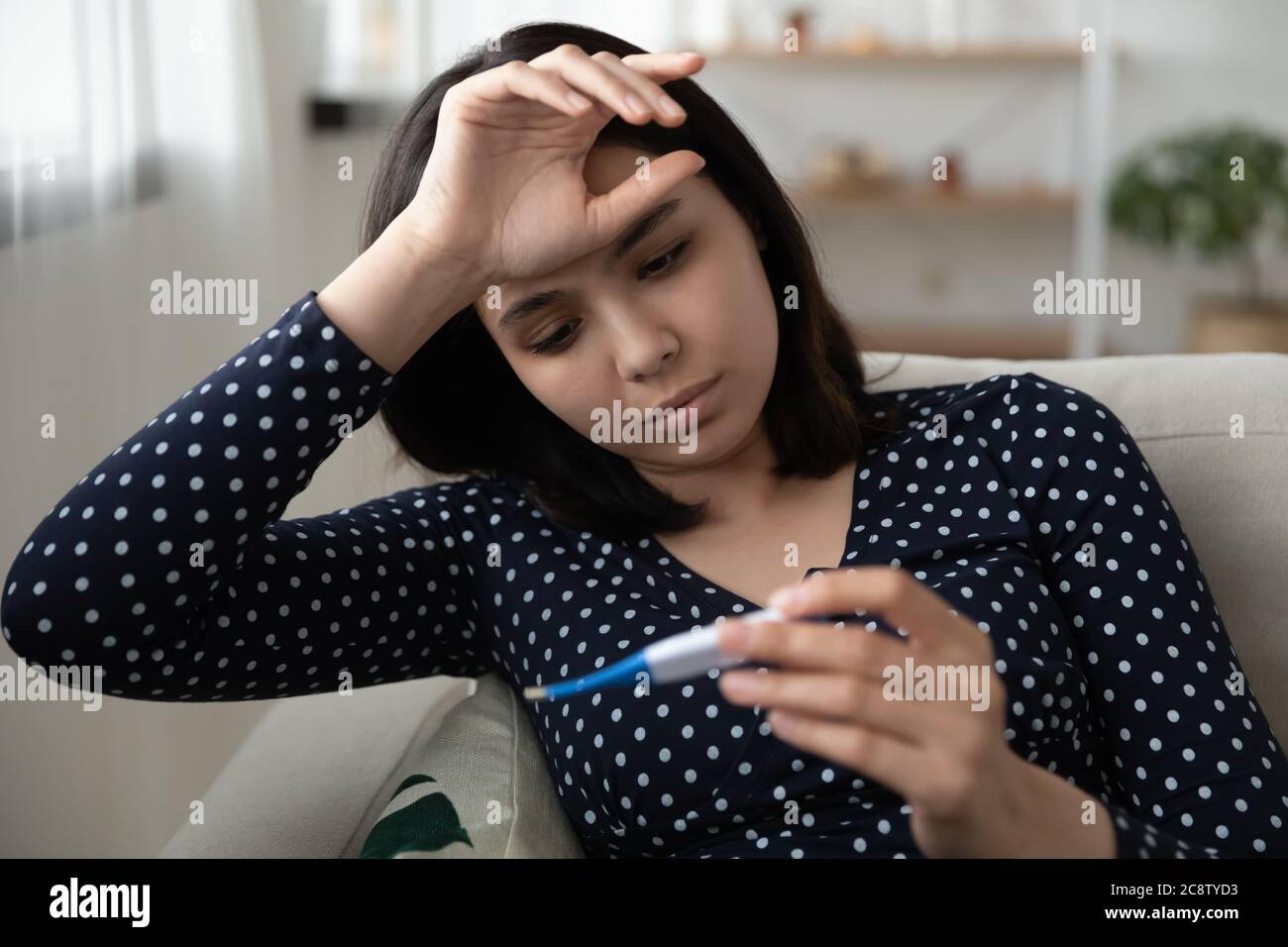 Sick asian girl with high fever hi-res stock photography and images - Alamy