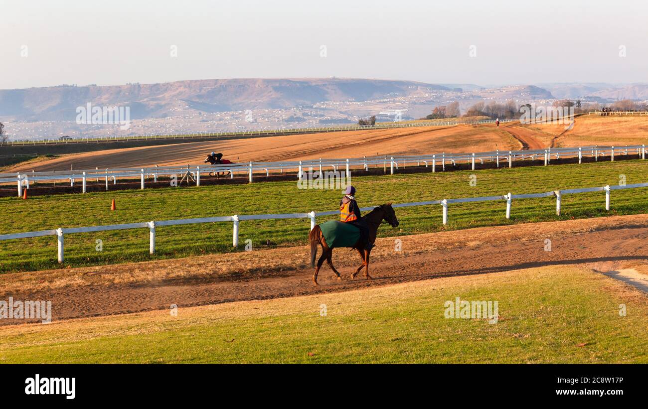 Race horses jockey riders training early a scenic outdoors equestrian ...