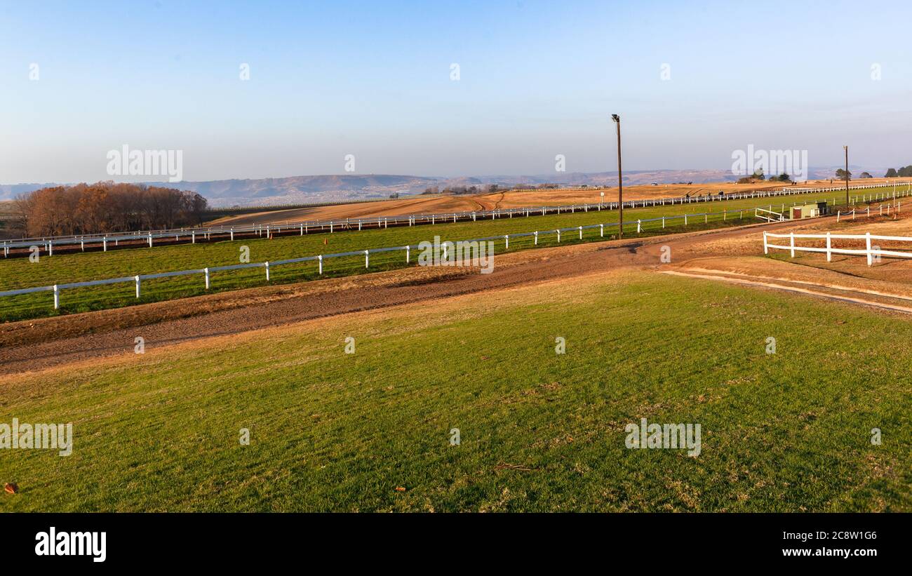 Race horse training tracks early a scenic outdoors equestrian panoramic ...