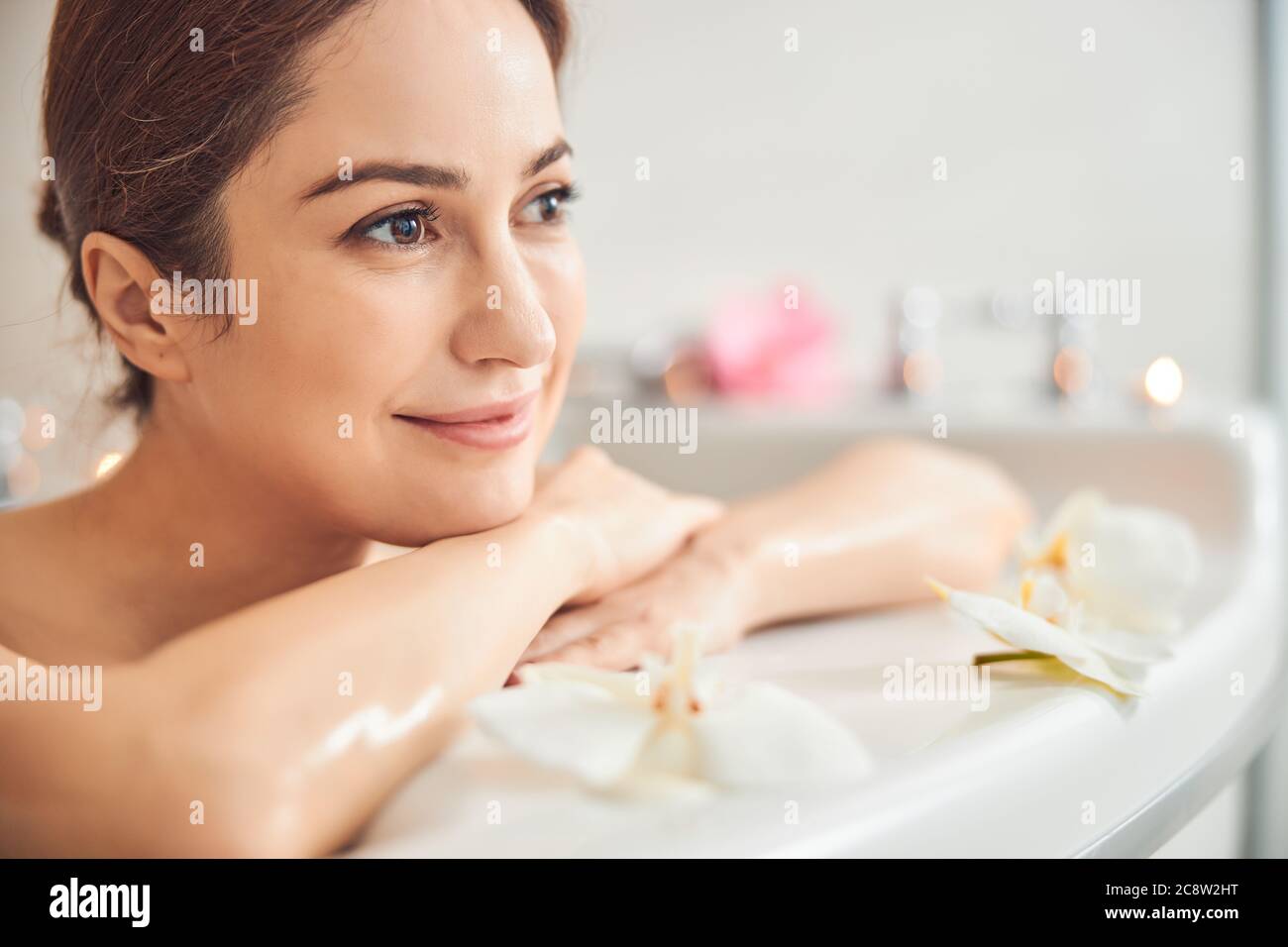 Beautiful young lady relaxing alone in bath Stock Photo - Alamy