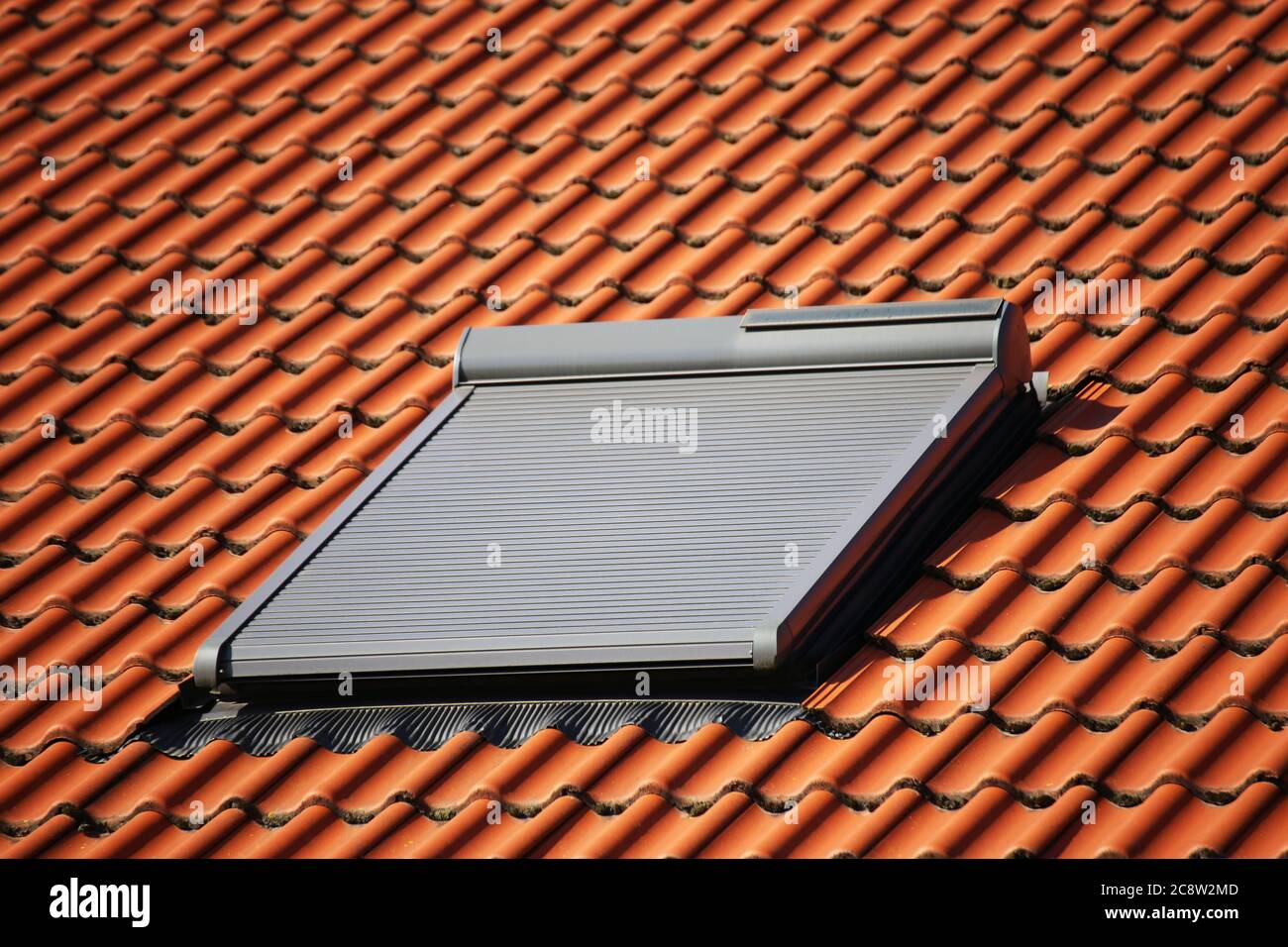 Roof window with roller shutter Stock Photo - Alamy