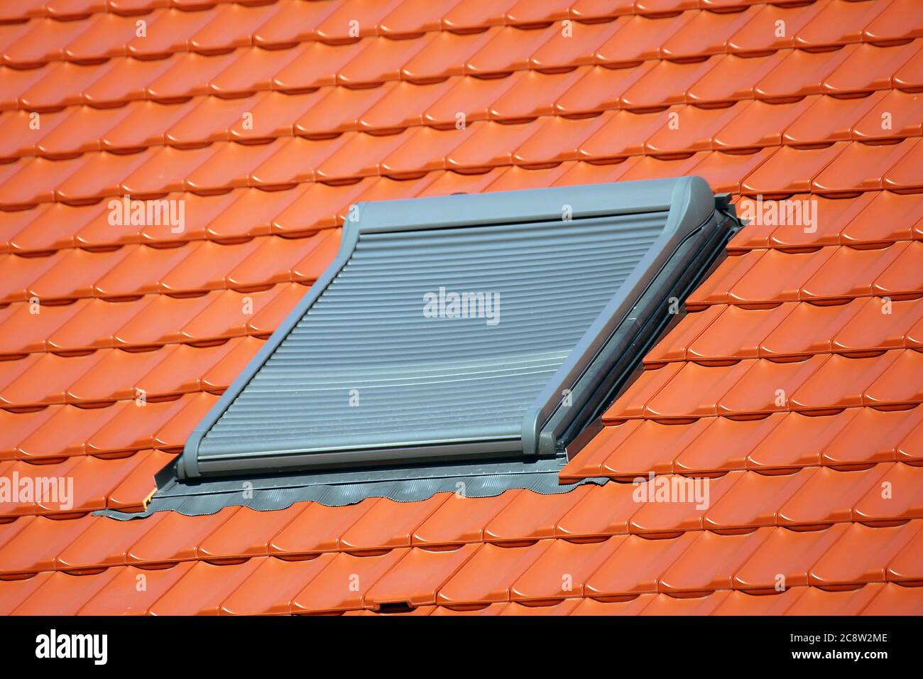 Roof window with roller shutter Stock Photo - Alamy