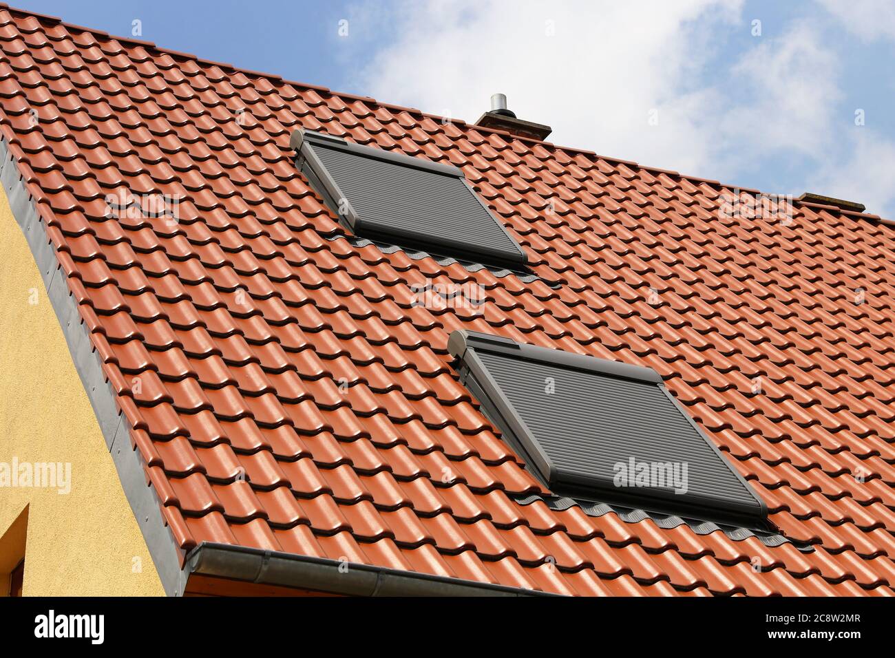Roof window with roller shutter Stock Photo - Alamy