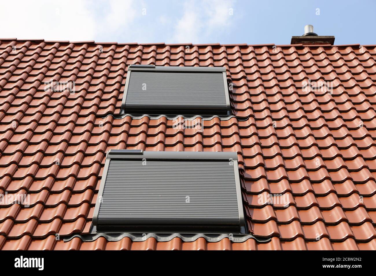 Roof window with roller shutter Stock Photo - Alamy
