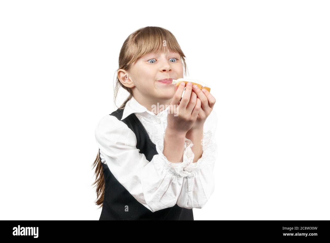 hungry schoolgirl look with admiration on her sandwich isolated on ...