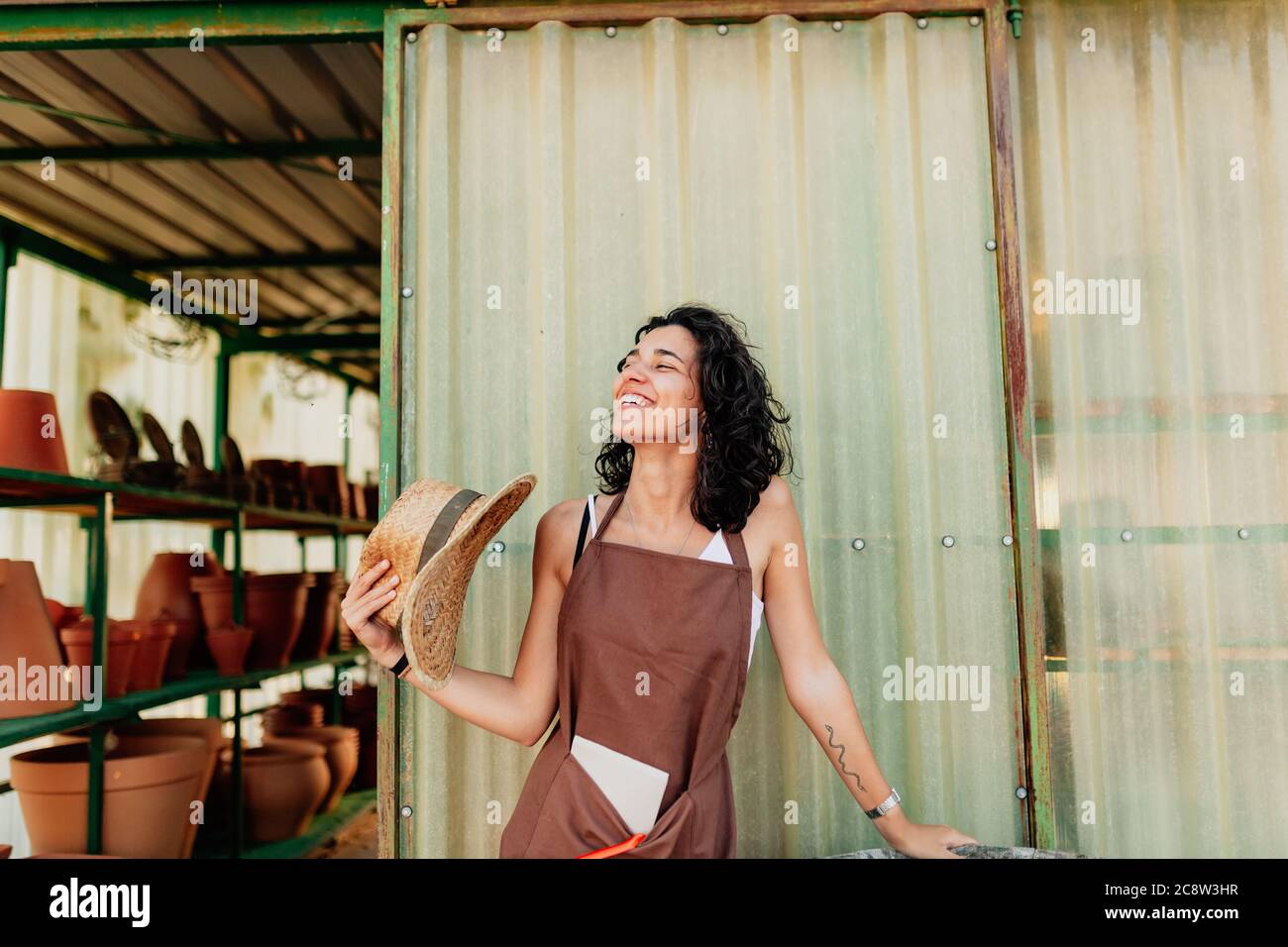 Woman fanning herself hi-res stock photography and images - Alamy