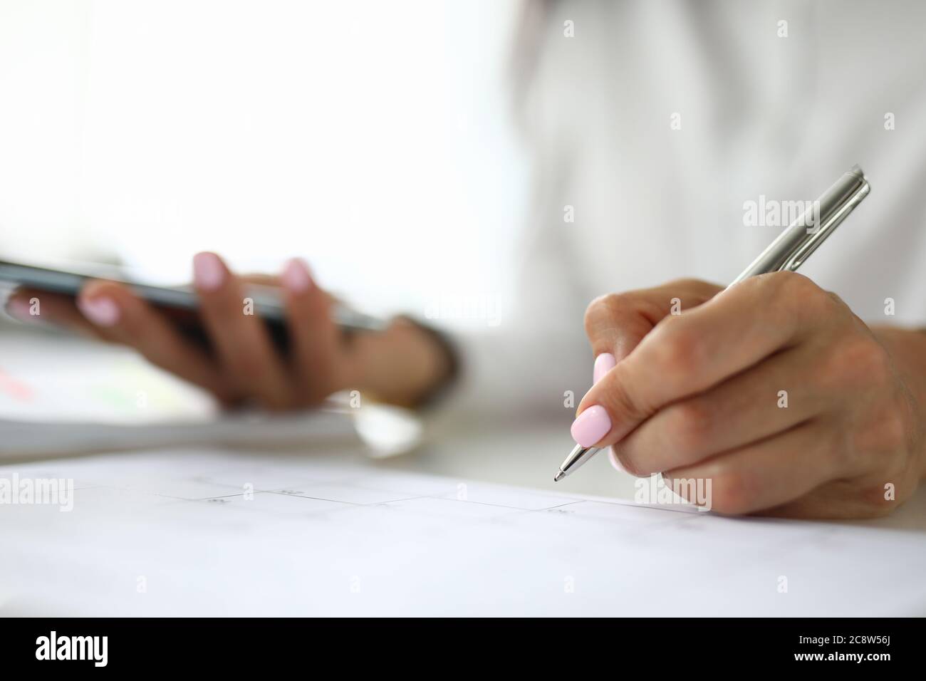 Womans hand ballpoint pen hi-res stock photography and images - Alamy