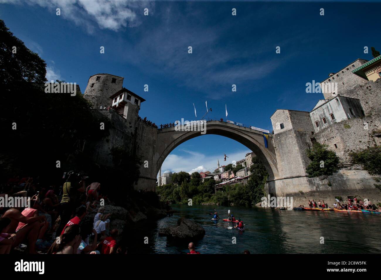 A diver jumps from the Old Mostar Bridge during the 454th traditional ...