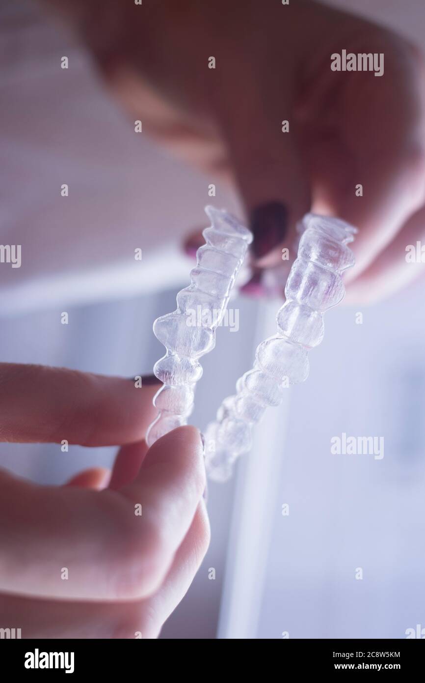 Clear dental teeth retainer brackets to straighten and align each tooth ...