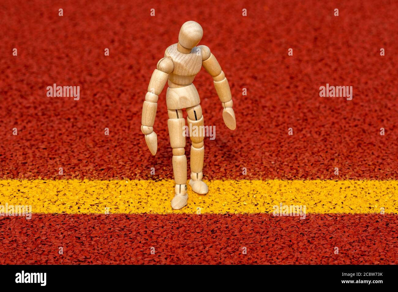 Start and challenge concept. Wooden man steps into the start line, get ...