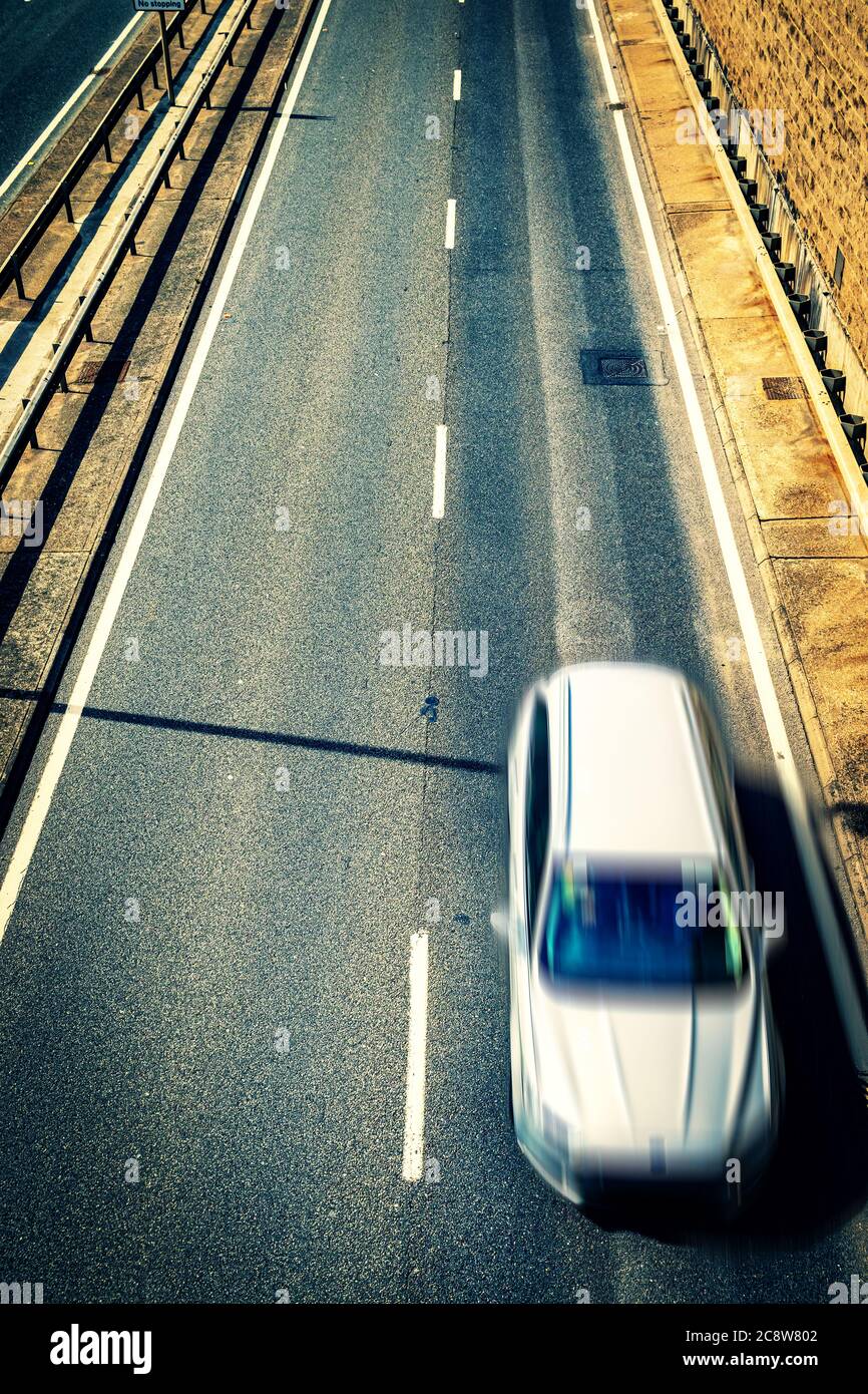 Blurred car from above rushing down the motorway Stock Photo - Alamy