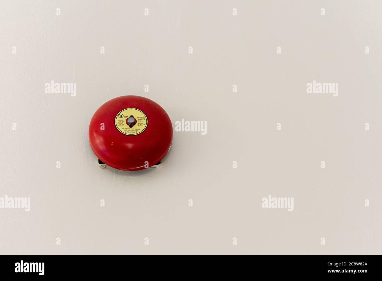 Industrial Fire Emergency Warning Bell on wall, Copy Space Stock Photo ...