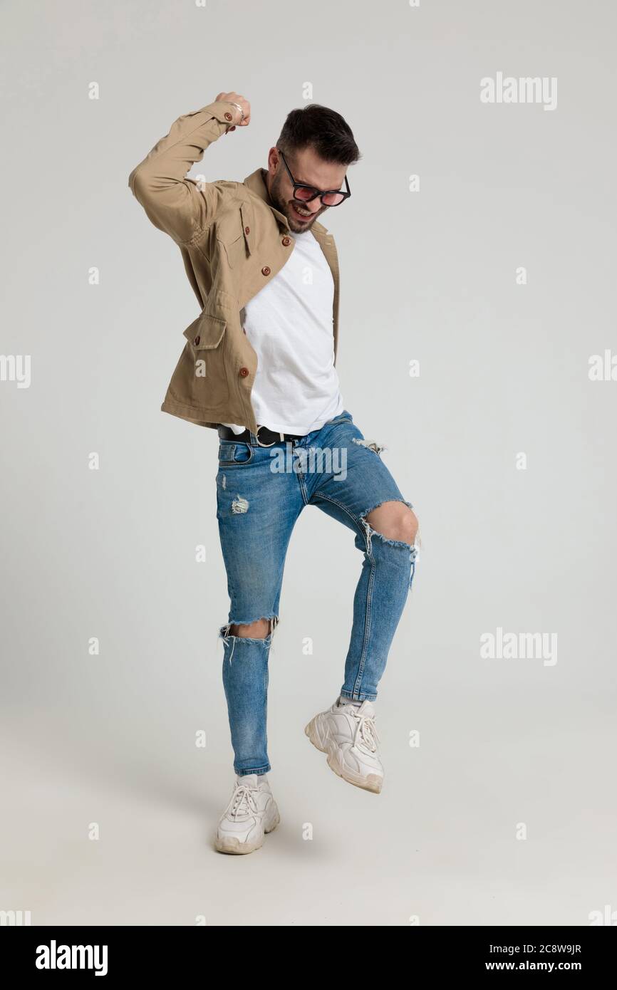 Man waving arms in air hi-res stock photography and images - Alamy