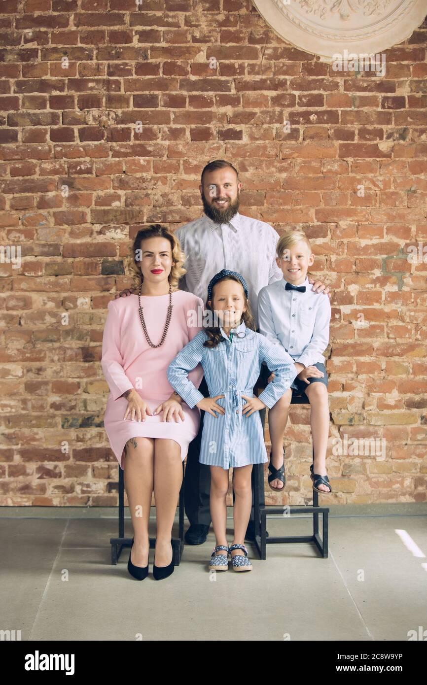 Classic. Happy family traditional portrait, old-fashioned. Cheerful ...