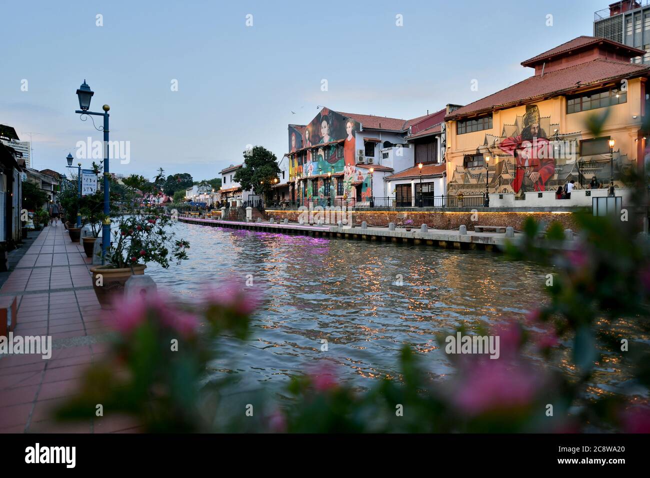 River Art reflects in the water of the Malacca River, Melaka Malaysia ...