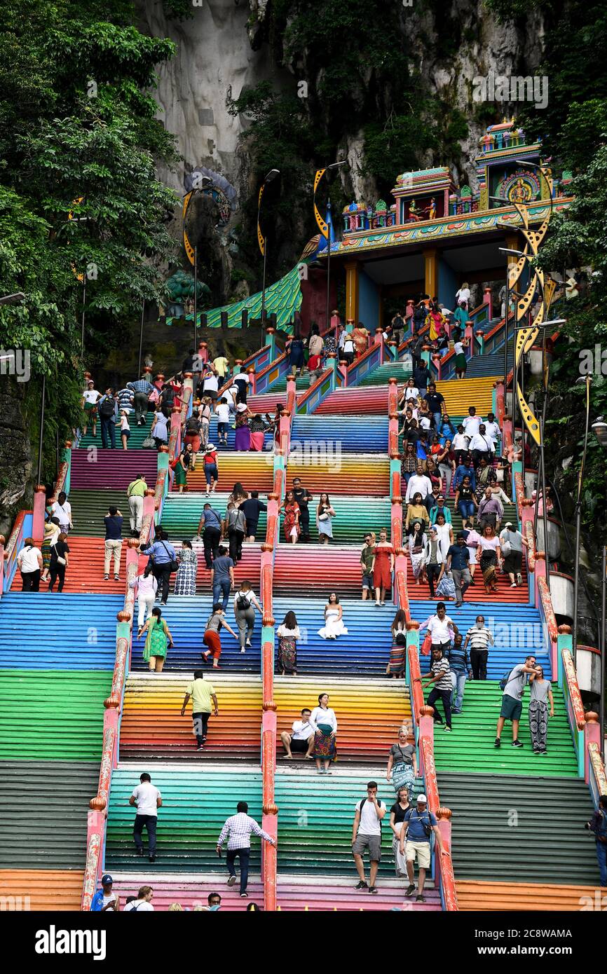The brightly coloured stairs that lead to the entrance to Batu Caves ...