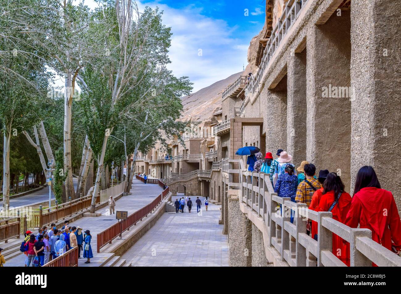 The tourist visiting UNESCO World Culture Heritage Mogao caves in ...