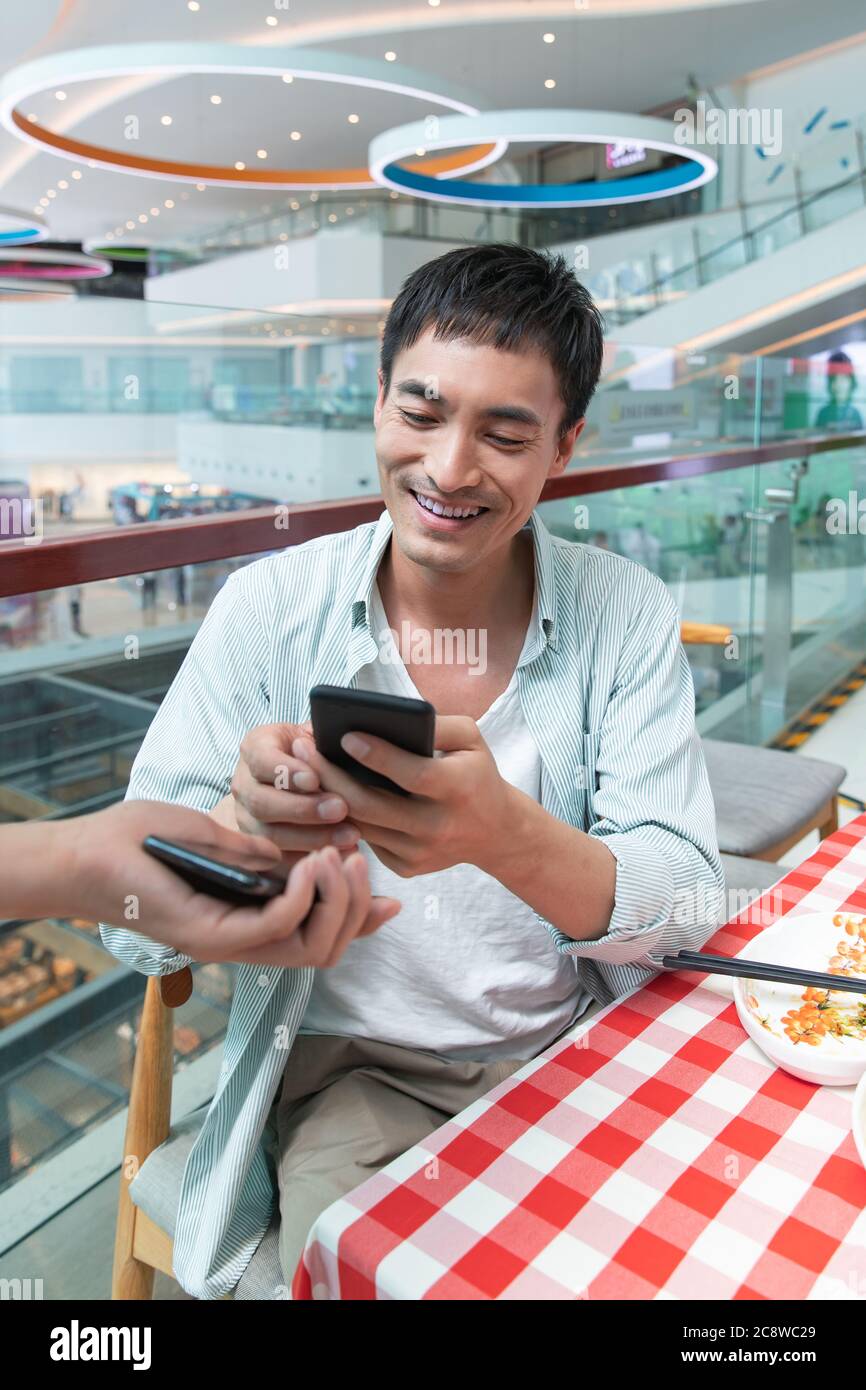 Middle-aged men in the restaurant Stock Photo - Alamy