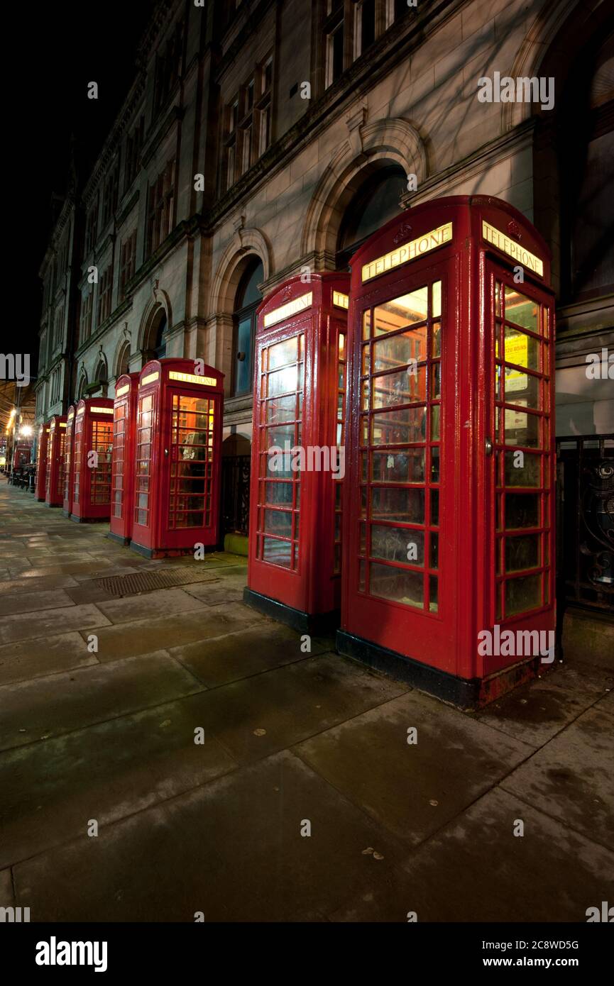 Row of Traditional Red Telephone Boxes in Preston, Lancashire, UK Stock ...