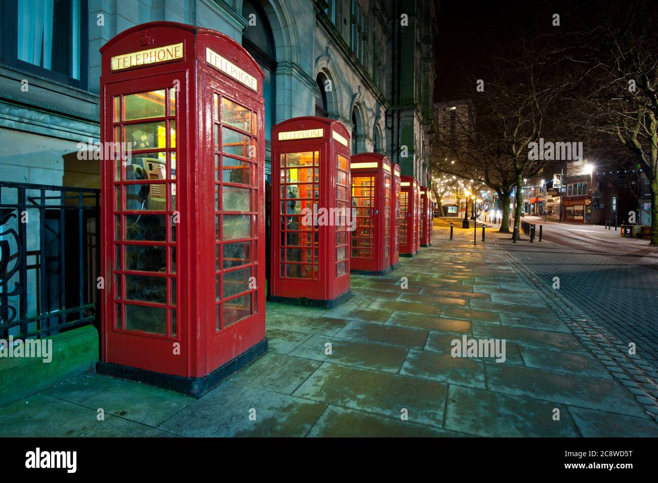 Row of Traditional Red Telephone Boxes in Preston, Lancashire, UK Stock ...