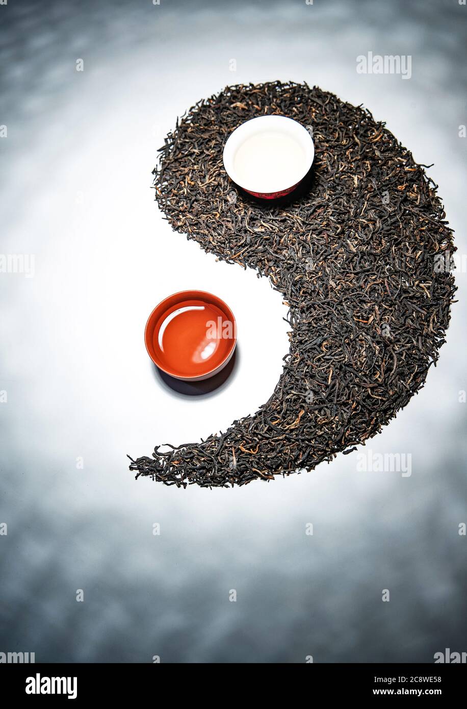 Taiji pattern composed of tea and tea cups Stock Photo - Alamy