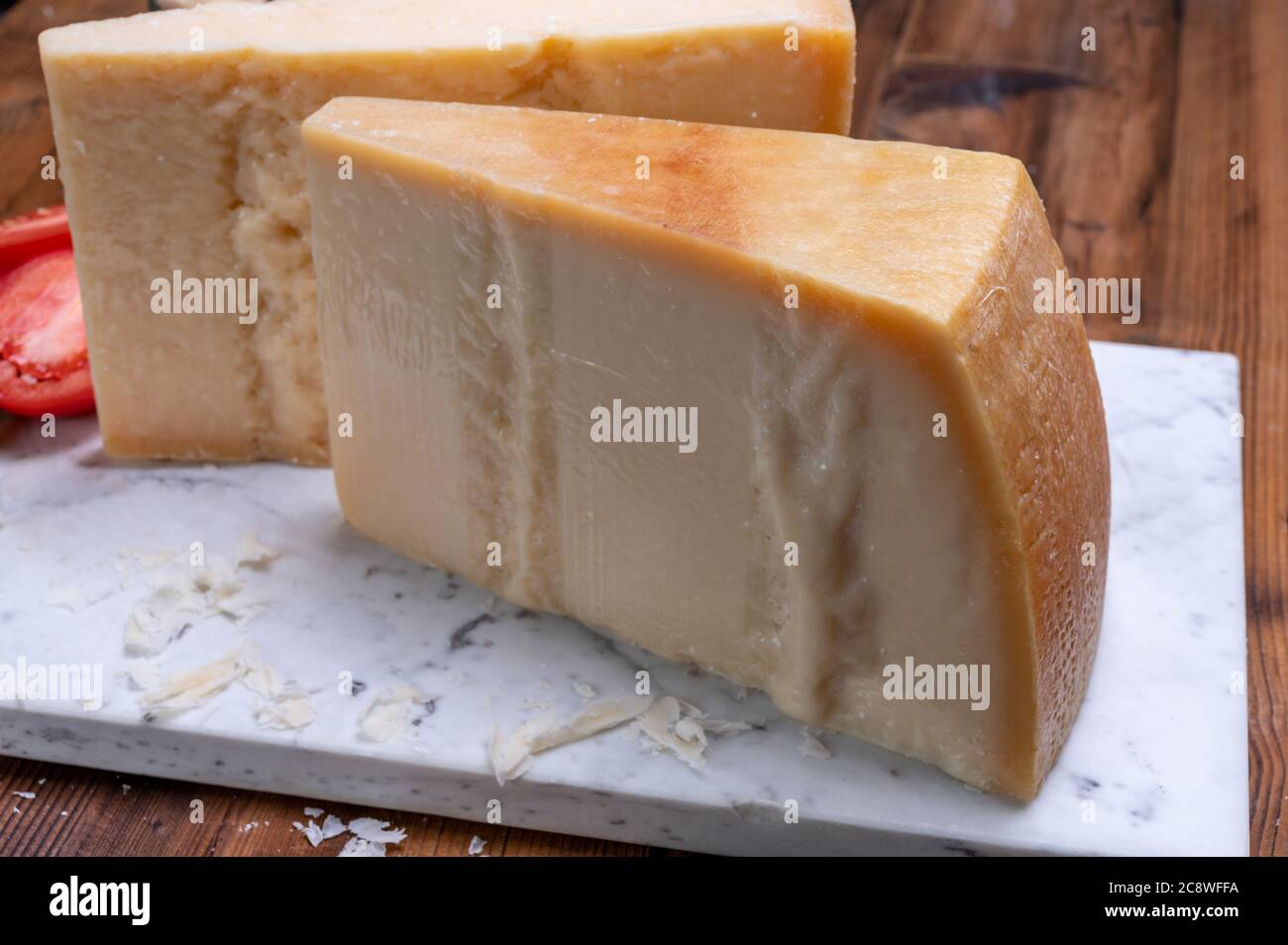 Big wedges of parmigiano-reggiano parmesan hard Italian cheese made ...
