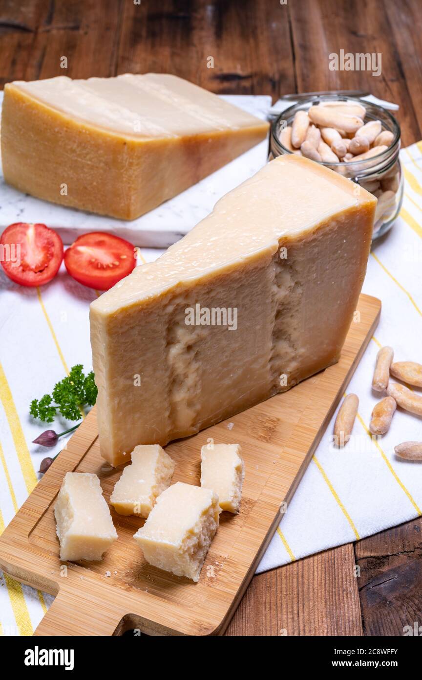 Big wedges of parmigiano-reggiano parmesan hard Italian cheese made ...