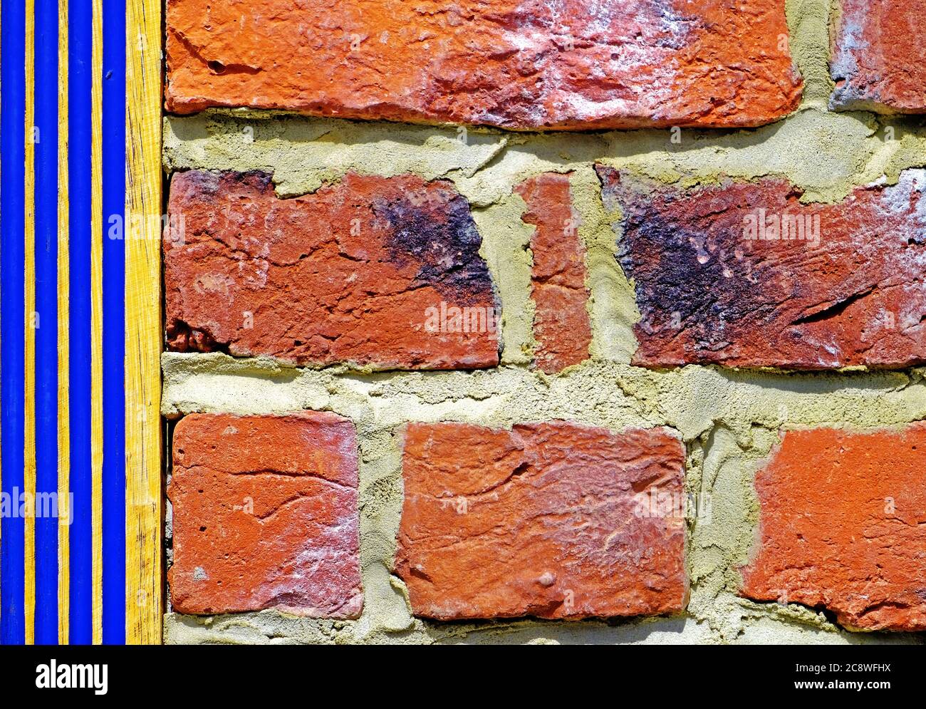 Blue stripes and brick wall Stock Photo - Alamy