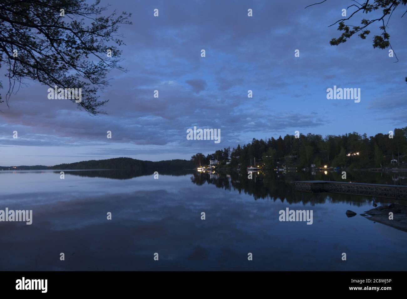Stockholm, Sweden A midsummer midnight sun view over lake Malaren and ...