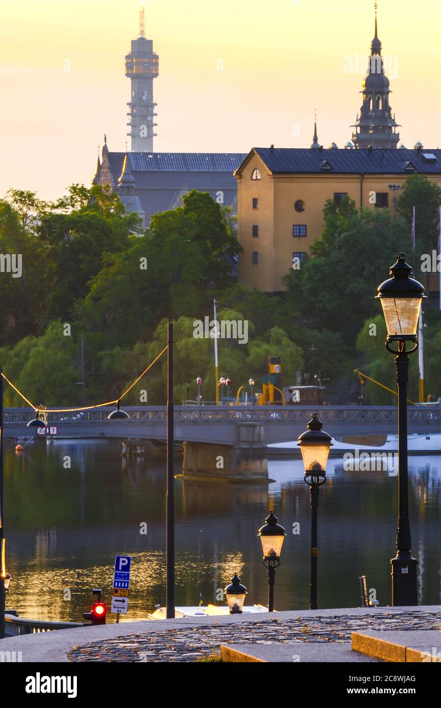 Stockholm, Sweden Classic lampposts decending from Slottsbacken at the ...