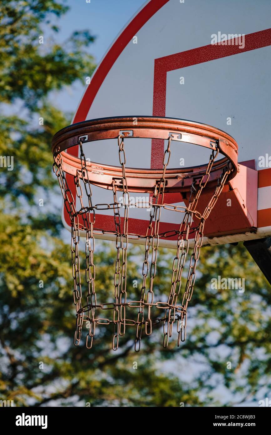 closeup of an outdoors basketball hoop at sunrise Stock Photo - Alamy