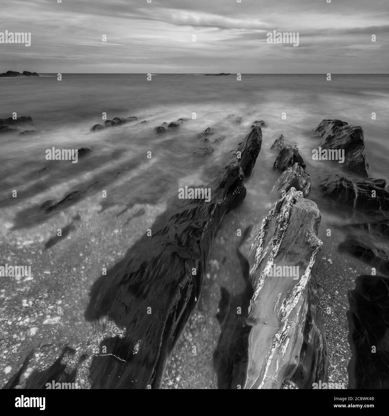 Long exposure on Westcombe beach at Ayrmer cove Stock Photo - Alamy
