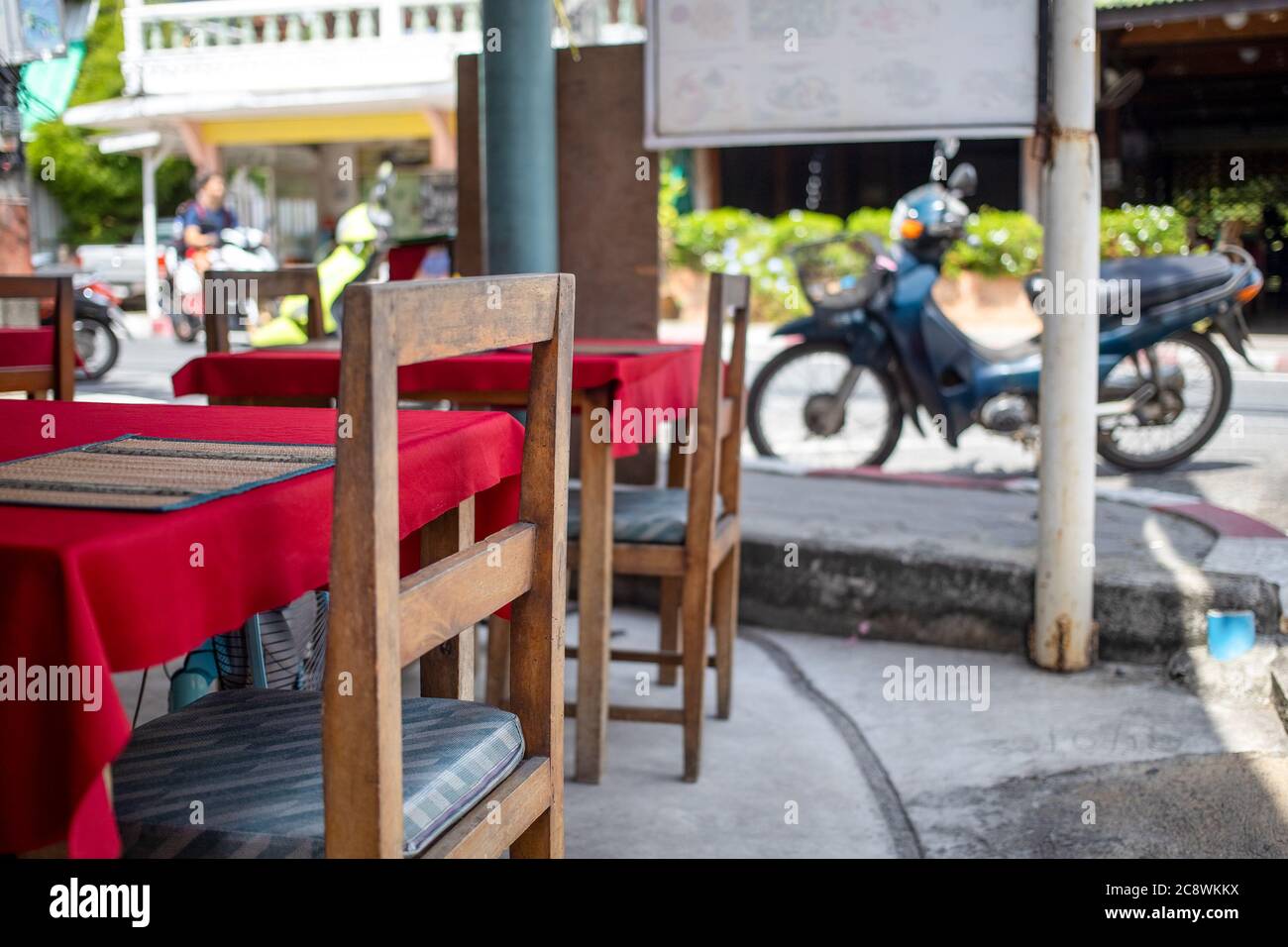 tables in asian street cafe.Concept of drinking tea, coffee and having ...