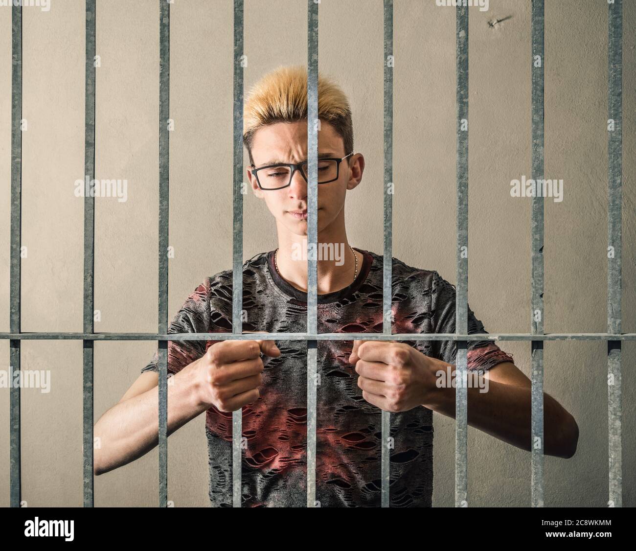 Man behind bars hi-res stock photography and images - Alamy