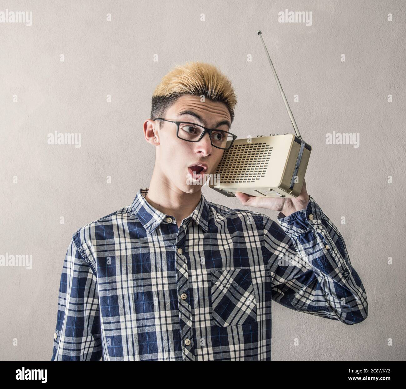 Listening to radio hi-res stock photography and images - Alamy