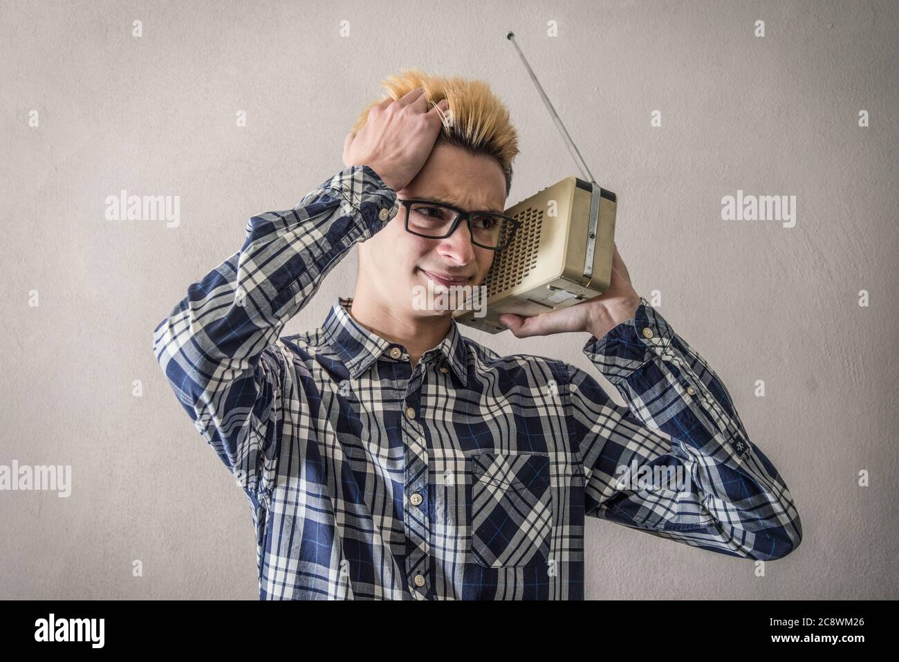 Listening to radio hi-res stock photography and images - Alamy
