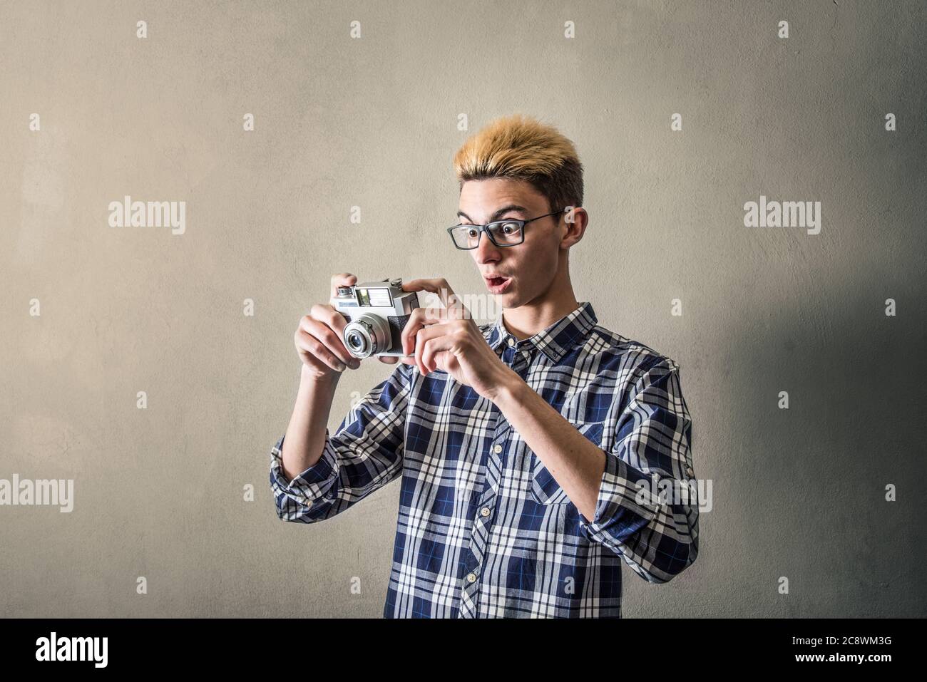 Boy hold photograph hi-res stock photography and images - Alamy