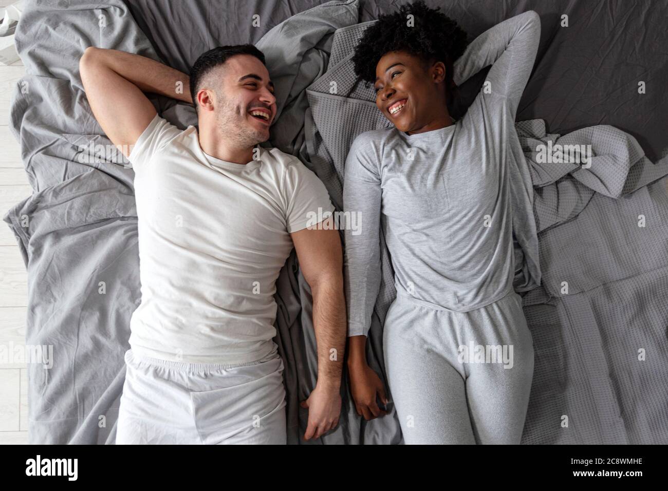 From above couple in bed in pijamas Stock Photo - Alamy