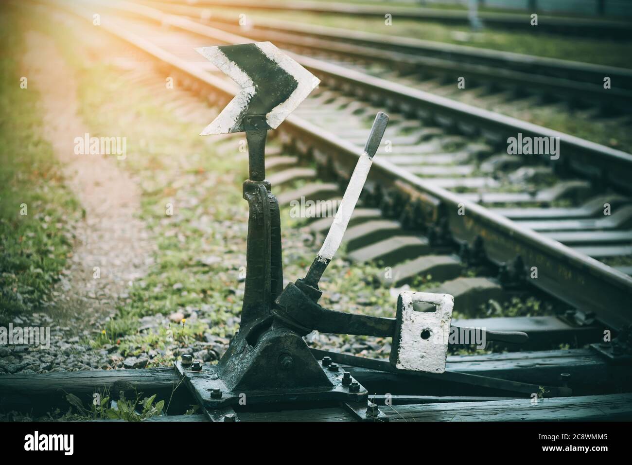 An old switch on the railway, where in the distance you can see the ...