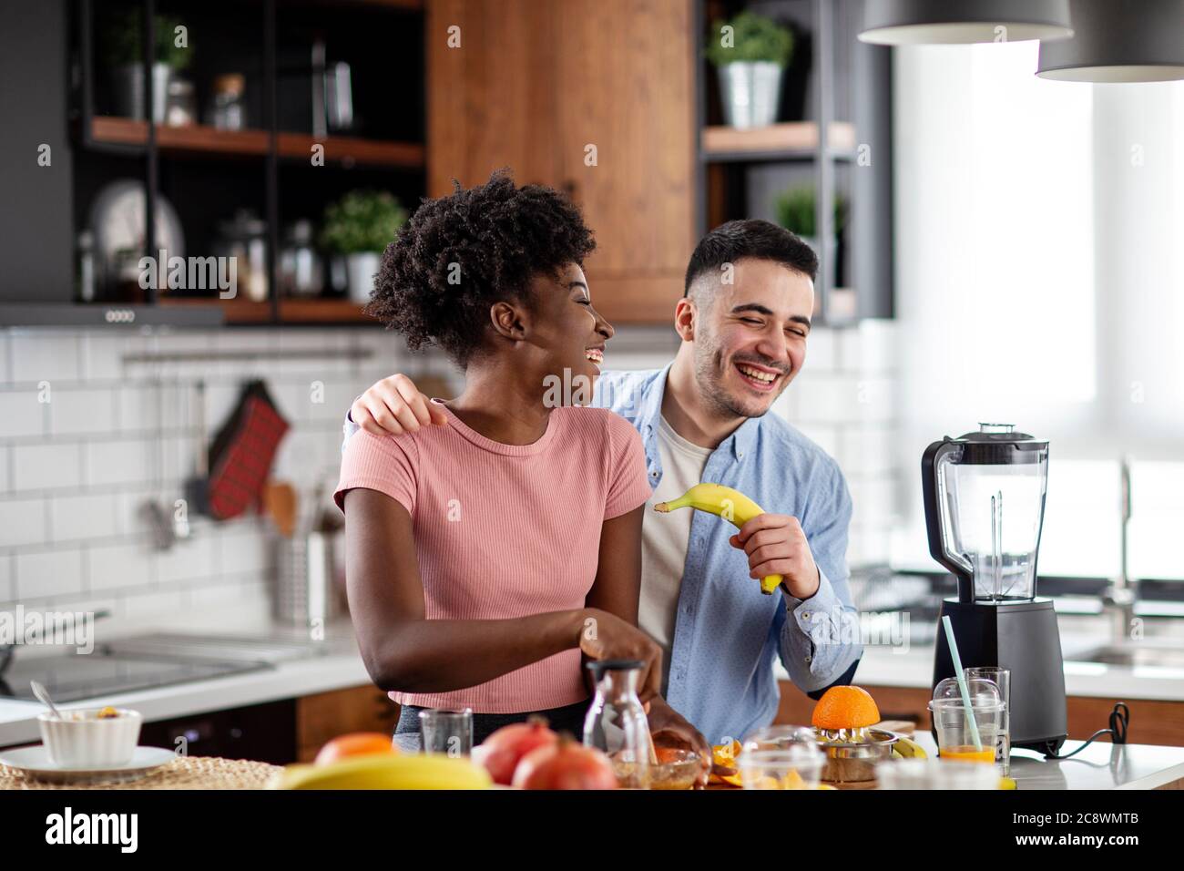 Young couple in kitchen hi-res stock photography and images - Alamy