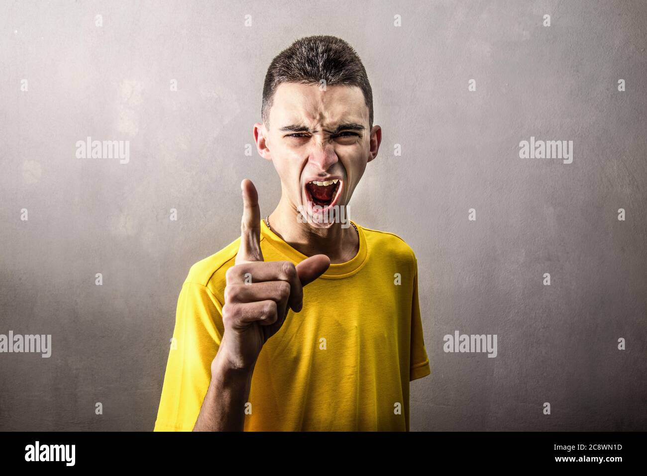 Angry guy yelling finger pointing hi-res stock photography and images ...