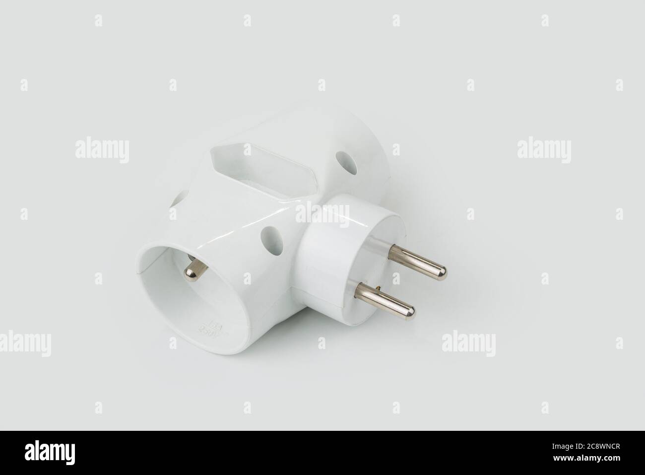 220V electric splitter on a white background Stock Photo - Alamy